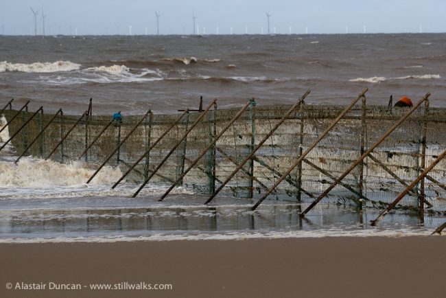 Dark Sea and Weathered Fence – StillWalks